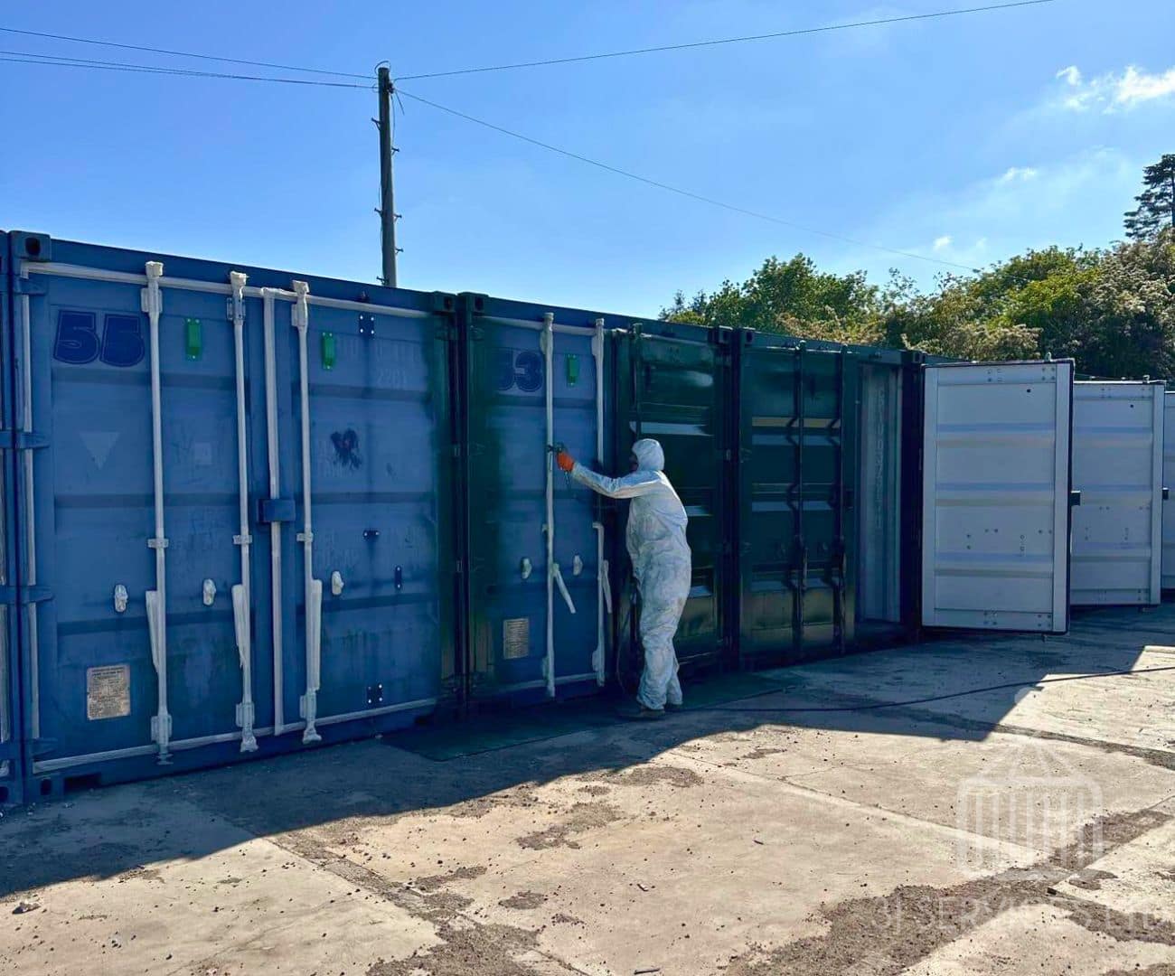 Self Storage Site Container Repaint and Door Modifications